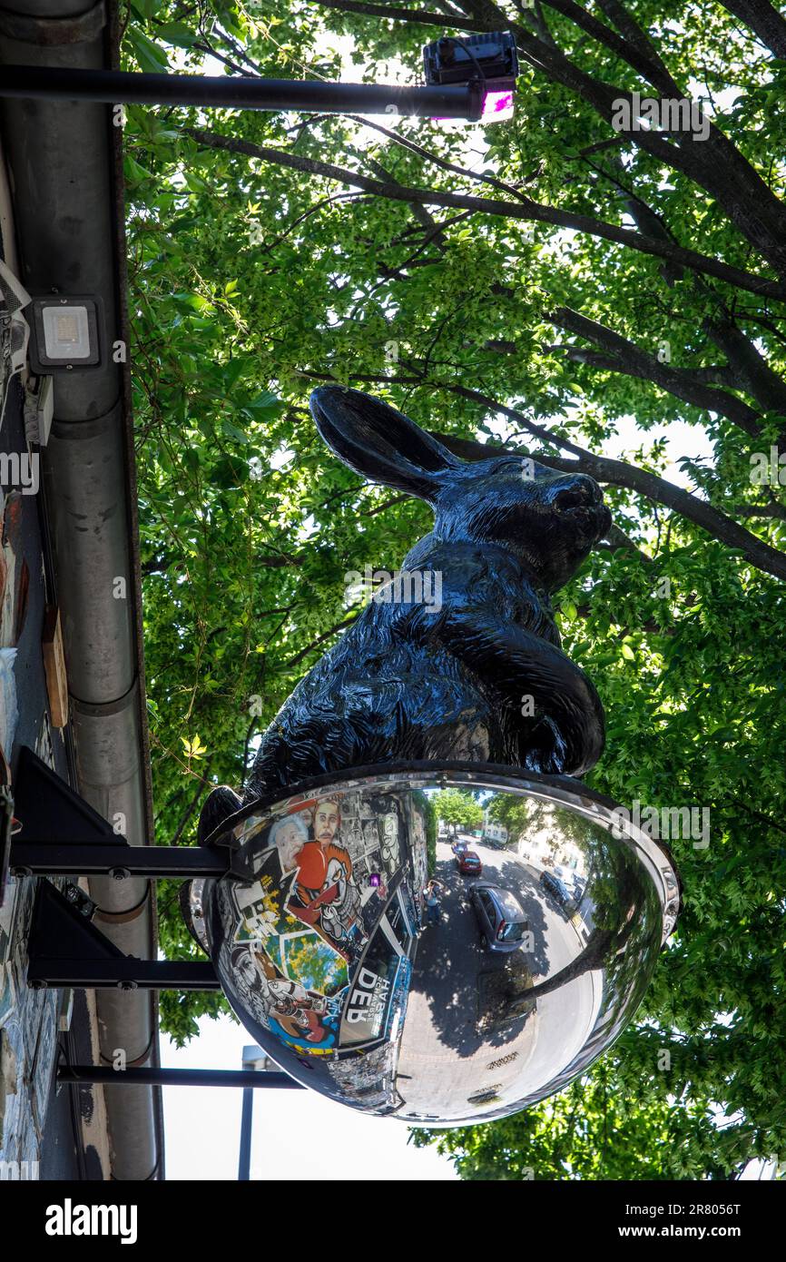 Rabbit on a mirror hemisphere above the entrance of the restaurant Der ...