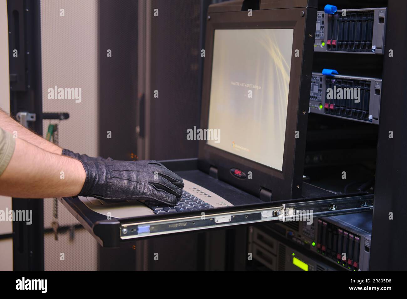 The monitor screen displays real-time data about potential hacking ...