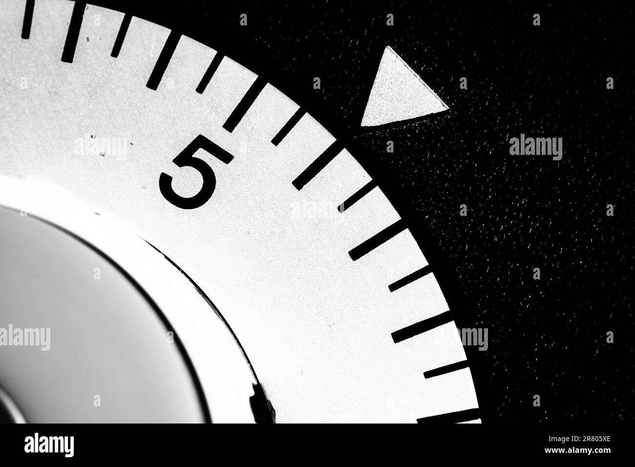 monochrome close-up of an analog laboratory timer set to six Stock ...