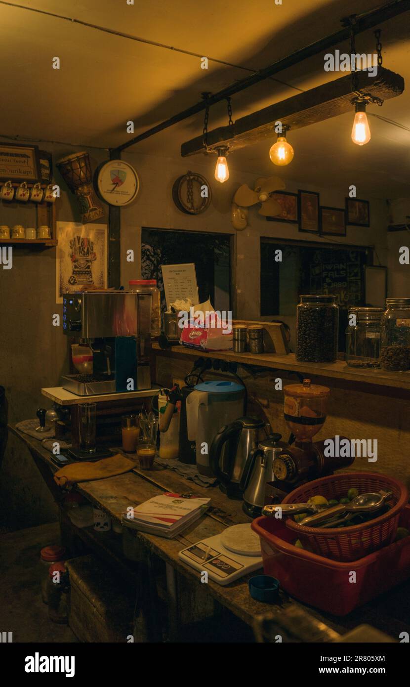 The atmosphere of the coffeeshop kitchen at night with dim lights ...