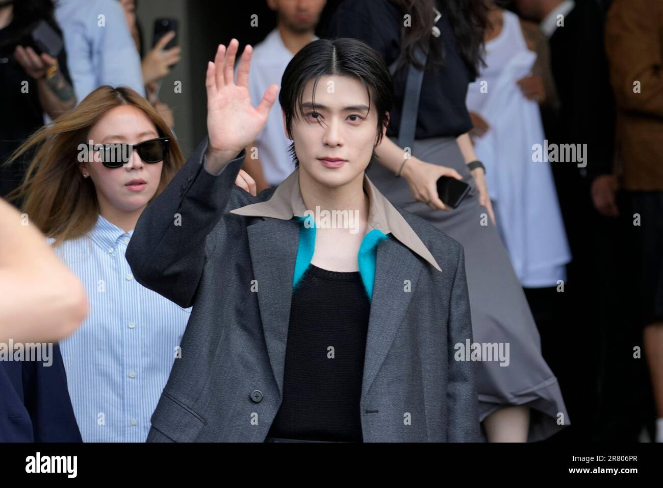 Korea's singer Jaehyun, member of K-Pop boy group NCT 127, waves his fans at the end of the ...