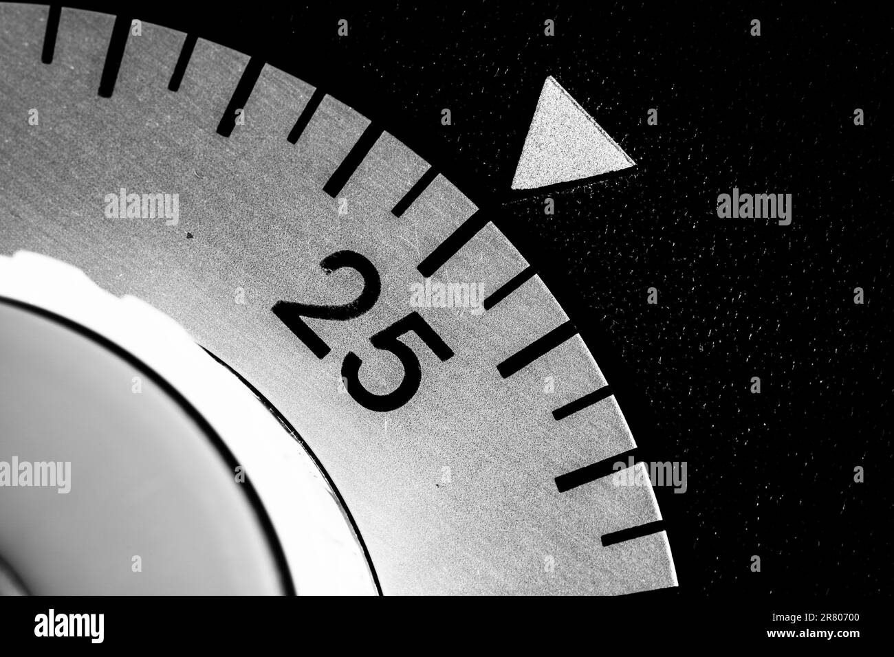 monochrome close-up of an analog laboratory timer set to 25 Stock Photo ...