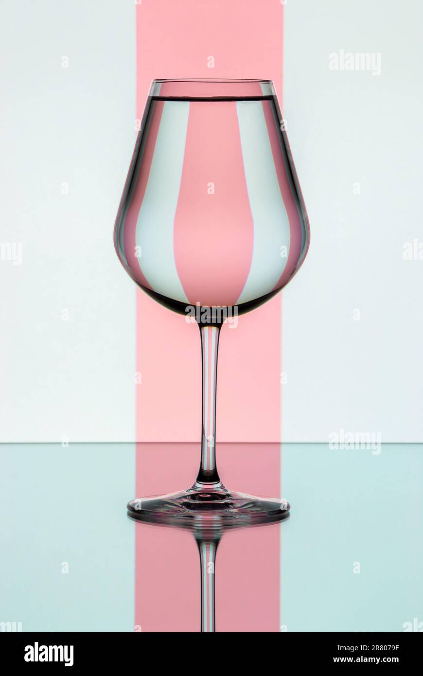 Pattern distortions seen through a glass of water. Still life Stock ...