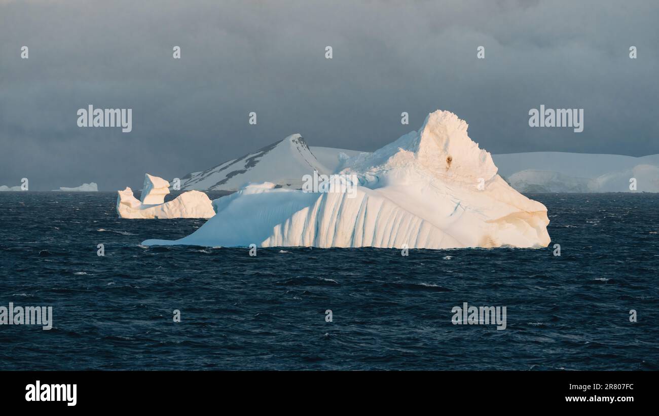 Single iceberg floating in water. Antarctica and Arctic Greenland ...