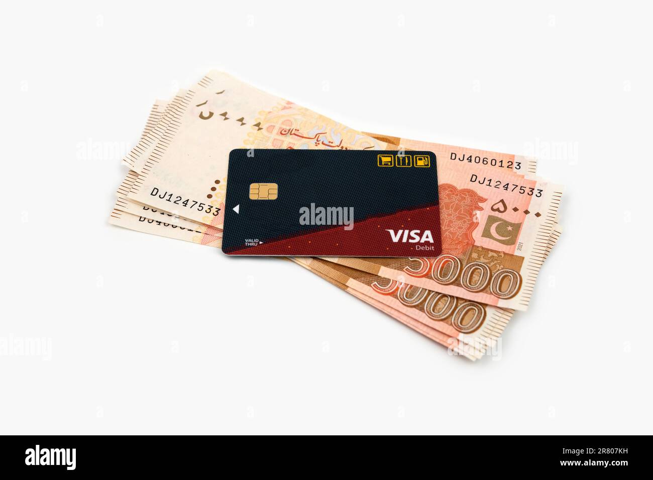 The Visa Debit Card and Pakistani Rupee currency notes Stock Photo - Alamy