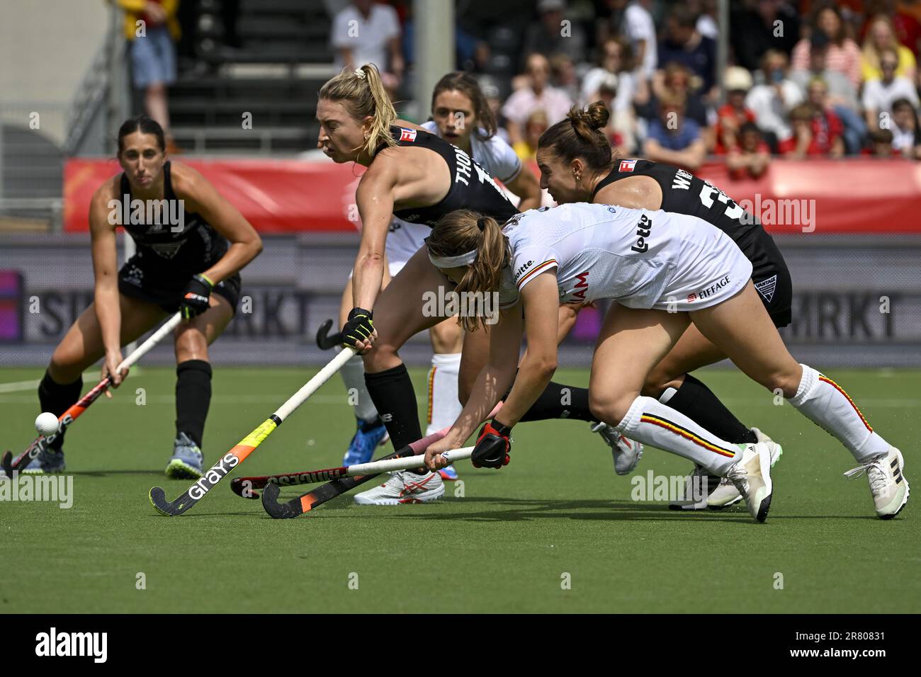 New Zealand's Liz Thompson and Belgium's Emily White pictured in action ...