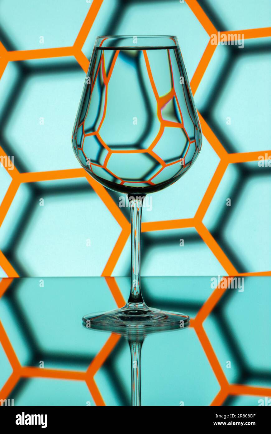 Pattern distortions seen through a glass of water. Still life Stock ...