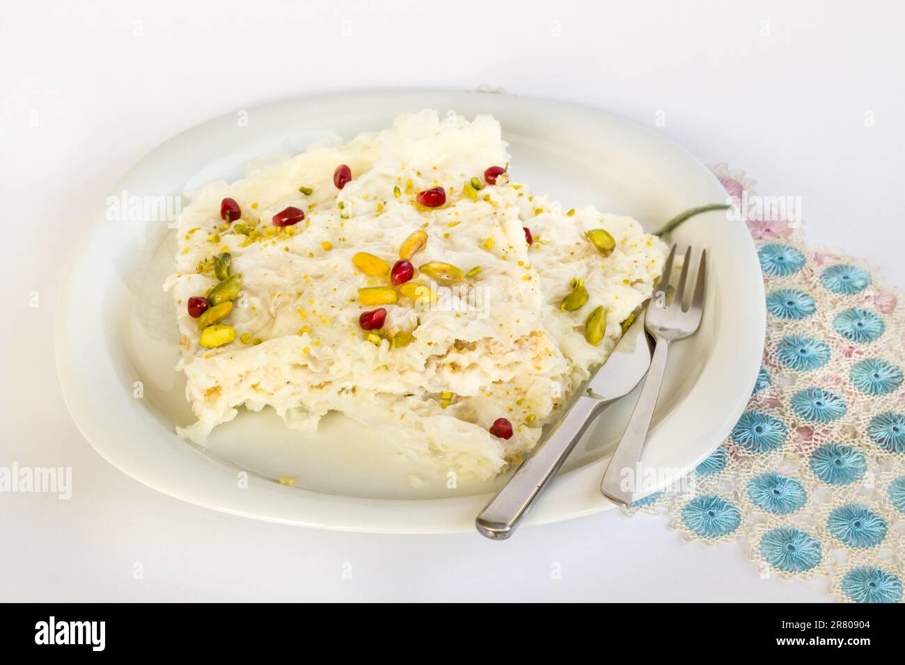 Traditional,Turkish Ramadan Dessert Gullac one portion on plate with ...