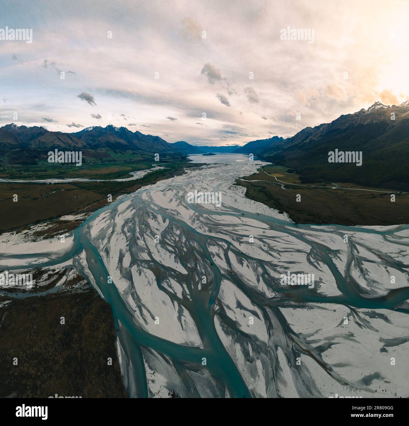 Bird's eye aerial drone view of Glenorchy-Paradise Road crossing over ...