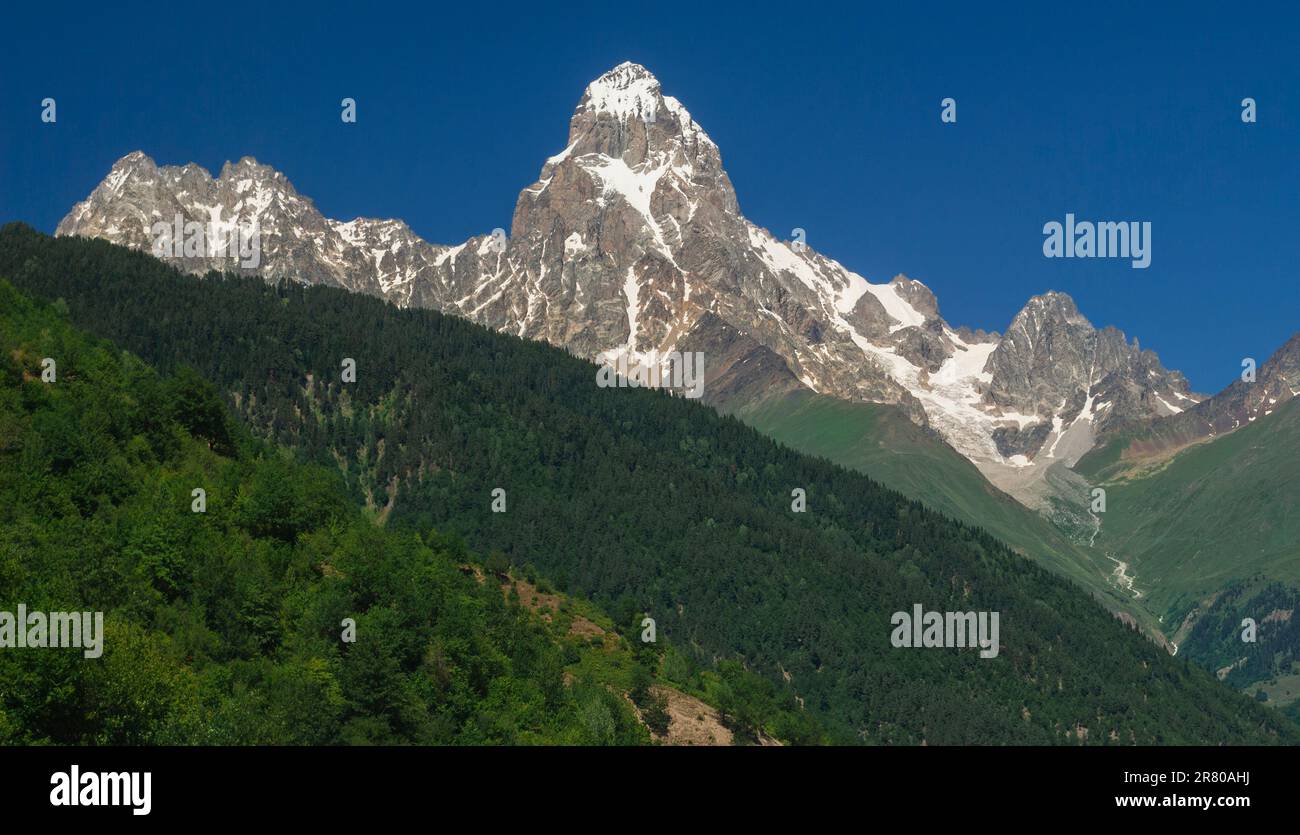 Mount Ushba. One of the most notable peaks of the Caucasus Mountains ...