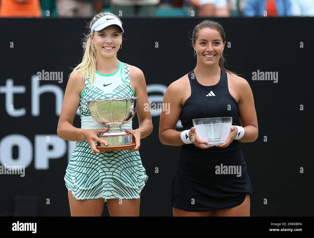 Katie Boulter (left) and Jodie Burrage pose with their trophies after ...