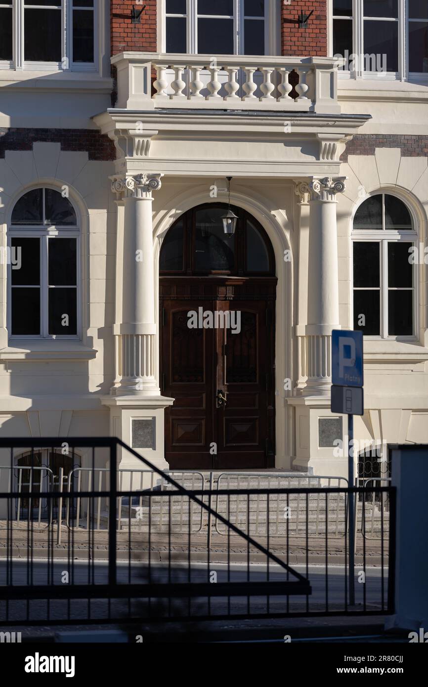 The main entrance to the historic building maintained in the neo-Gothic ...