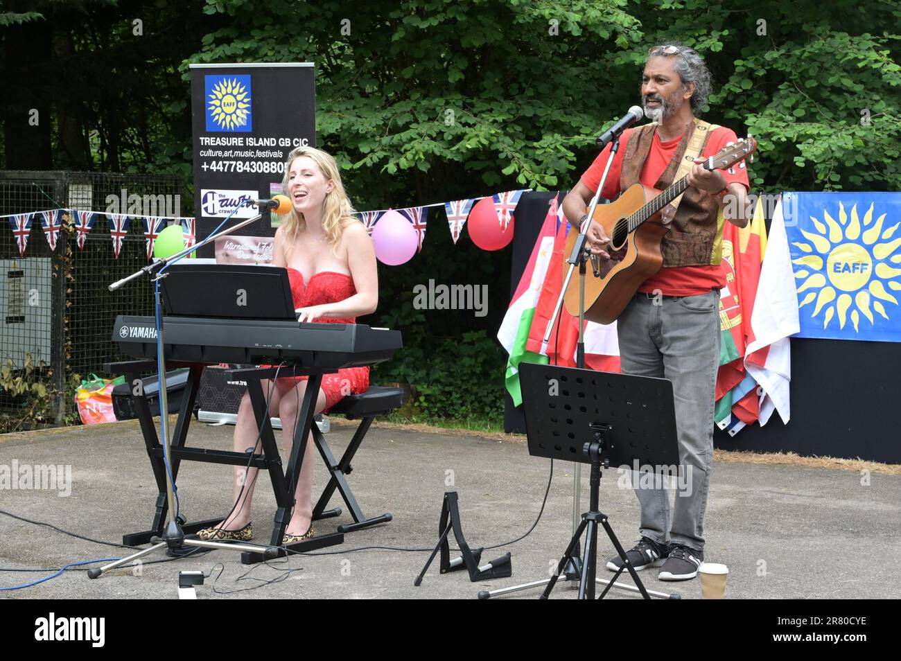 Crawley, West Sussex, UK-June 18th 2023 : A guitarist and a keyboard ...