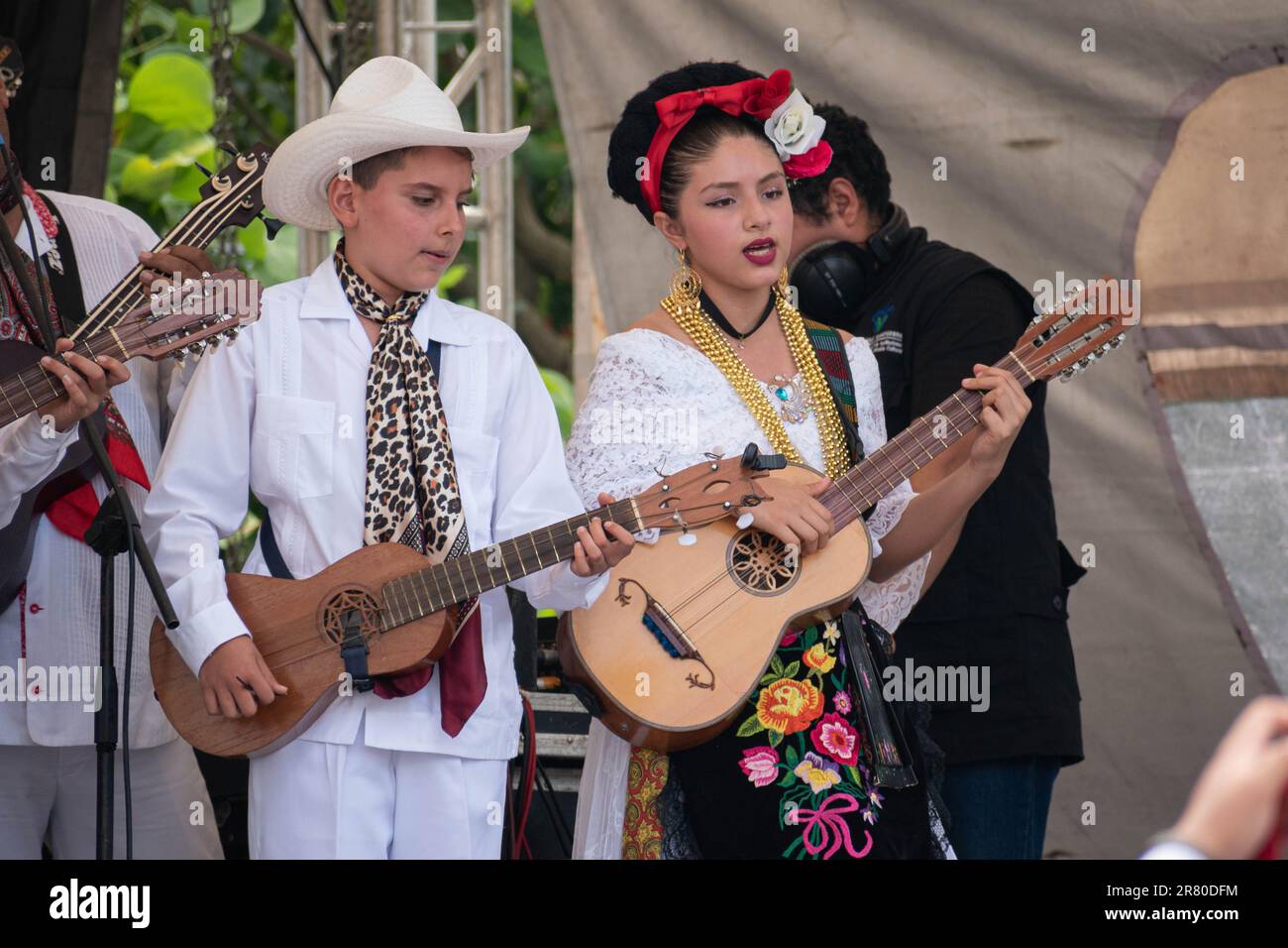 A closeup of a boy and girl dressed in traditional clothes from ...