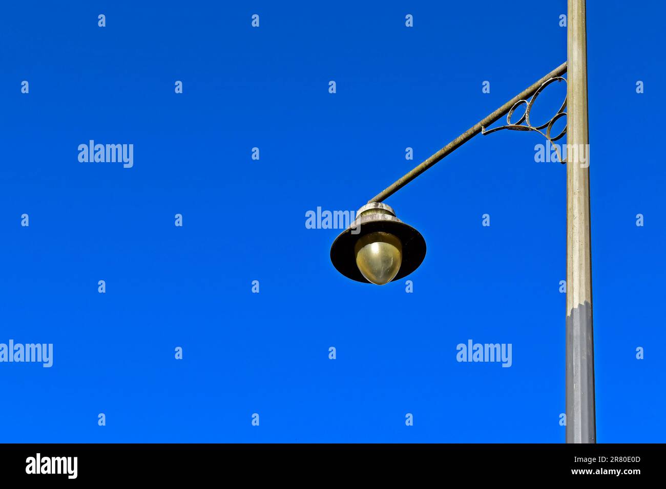 Antique street lamp against a blue sky in Petropolis, Rio de Janeiro ...