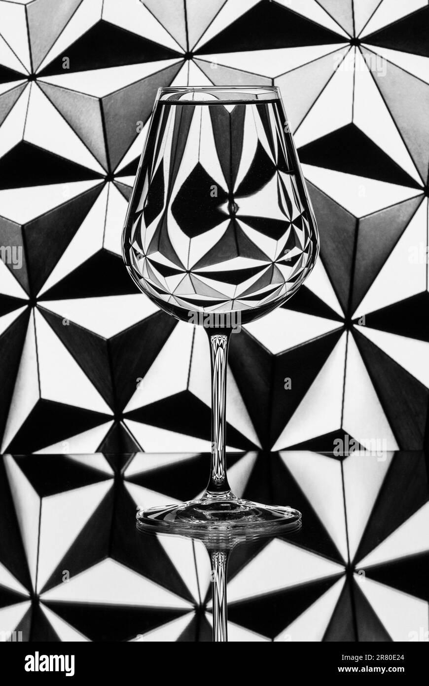 Pattern distortions seen through a glass of water. Still life Stock ...