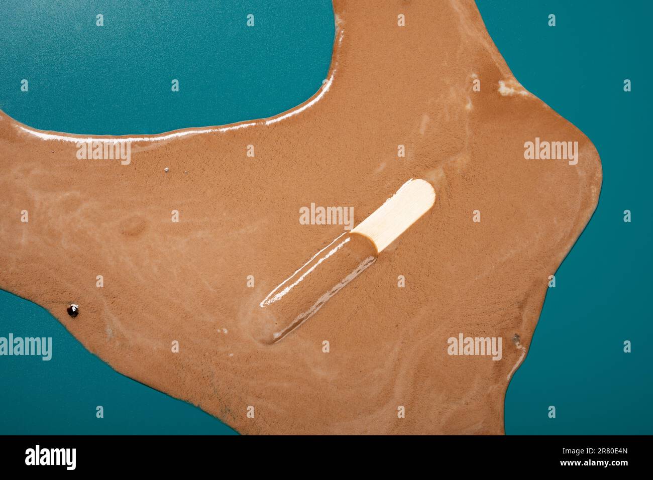 top view melted cute tiger shape popsicle on dark green background ...