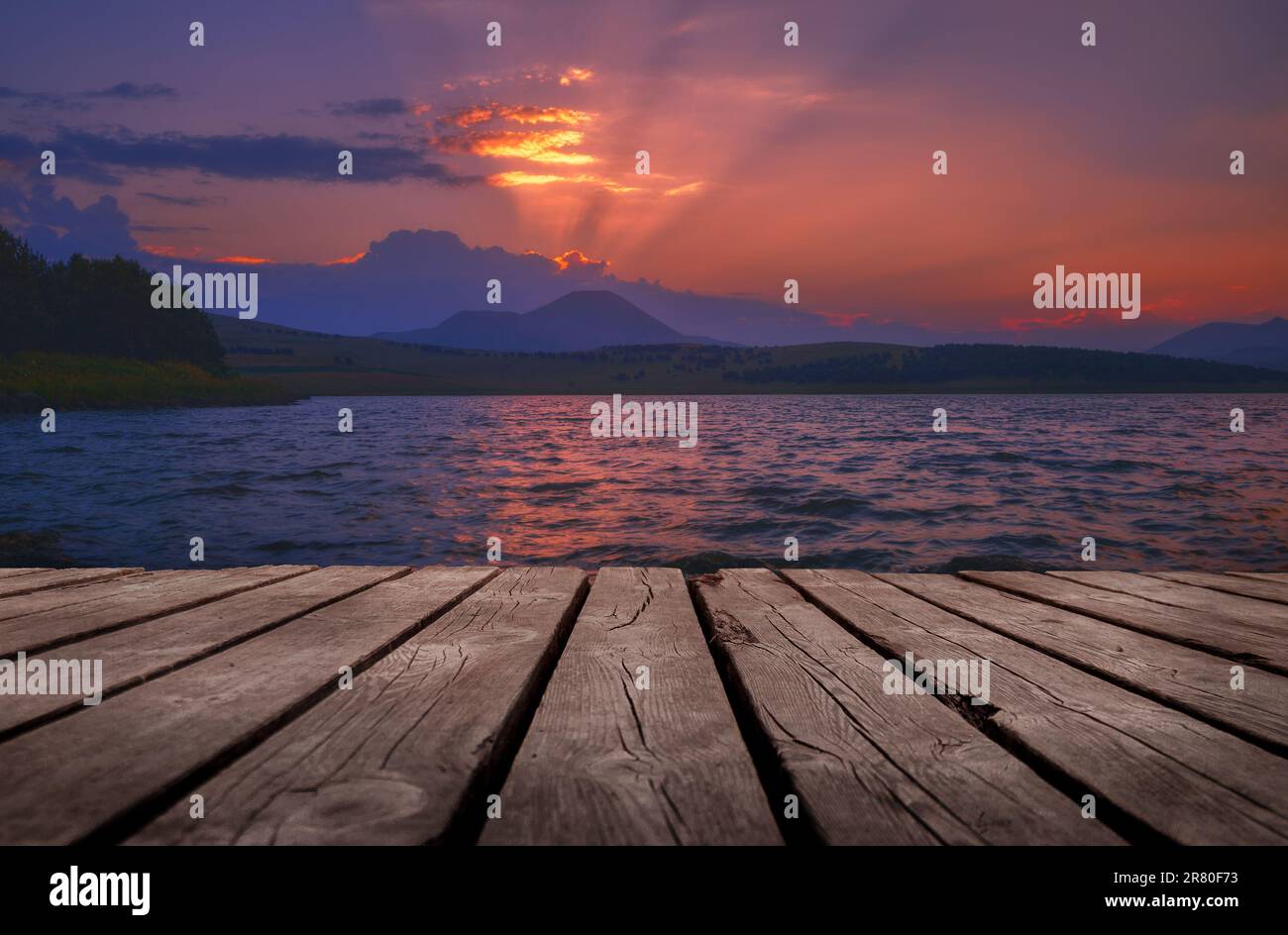beautiful lake with empty wooden table. Natural template landscape ...