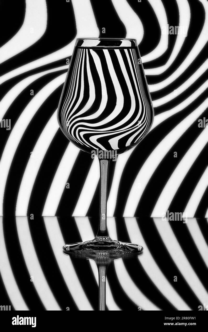 Pattern distortions seen through a glass of water. Still life Stock ...