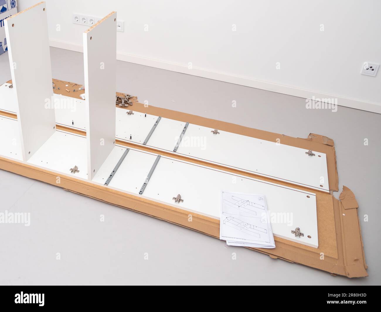 Assembly of furniture and tools for self-assembly of furniture on the ...