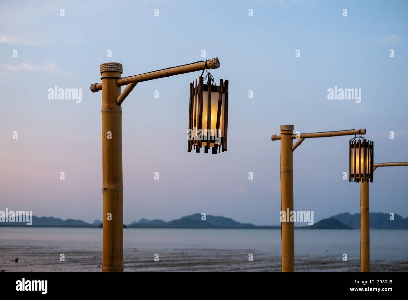 Old wooden bench with lamp post hi-res stock photography and images - Alamy