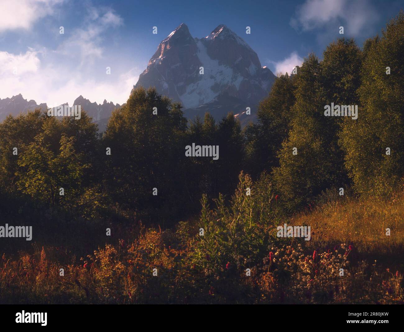 Mount Ushba. One of the most notable peaks of the Caucasus Mountains ...