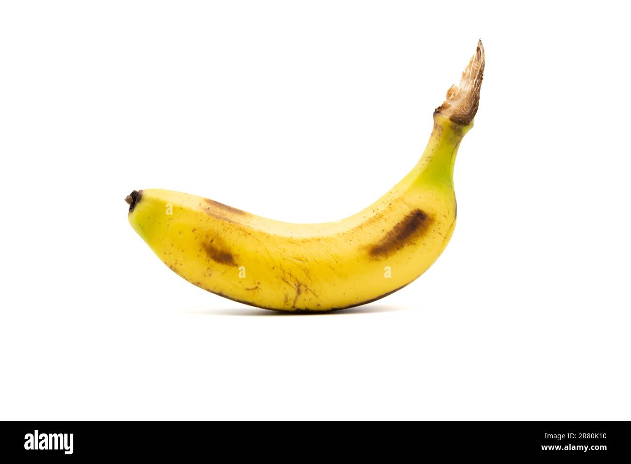 Single banana isolated on white background Stock Photo - Alamy