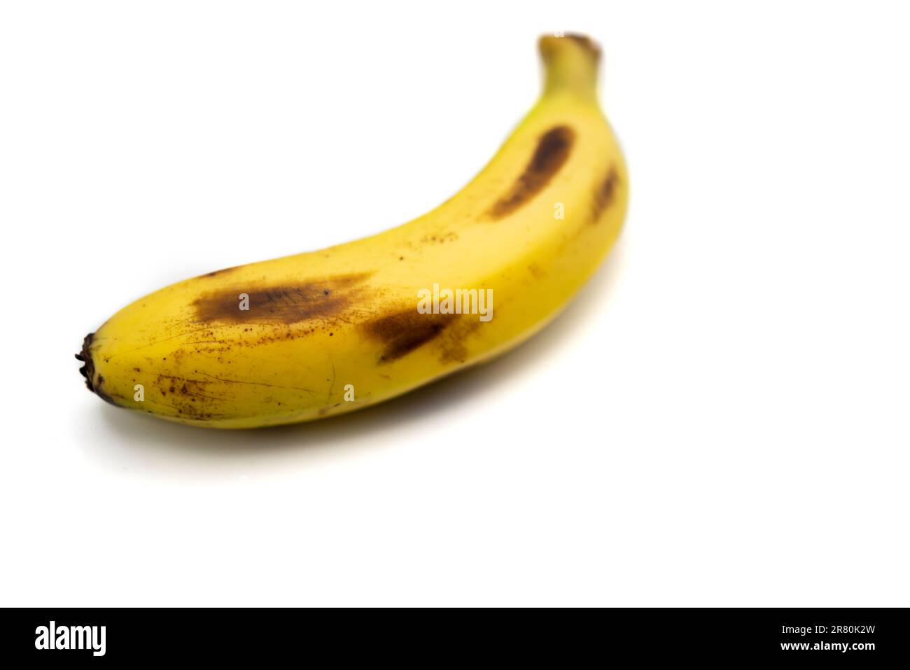 Single banana isolated on white background Stock Photo - Alamy
