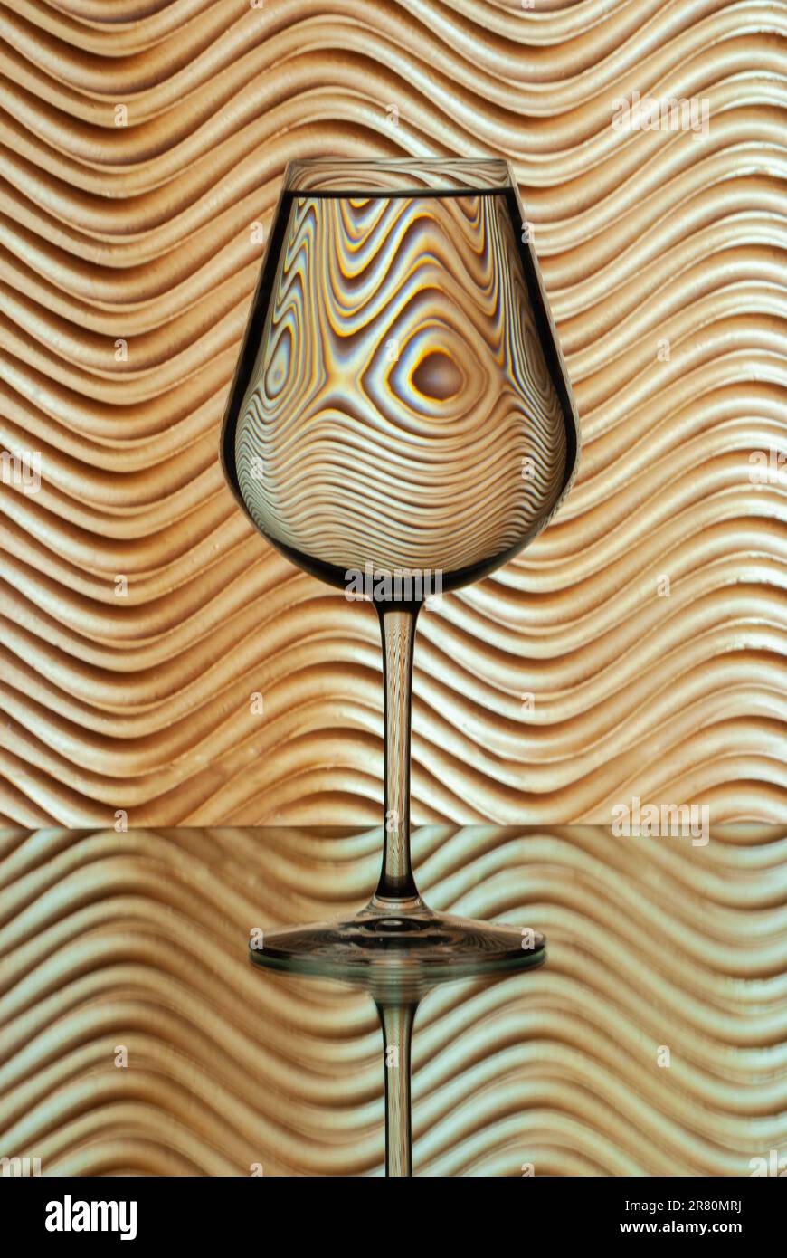 Pattern distortions seen through a glass of water. Still life Stock ...
