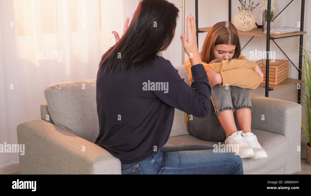 Parents blaming behavior talk mother daughter Stock Photo - Alamy