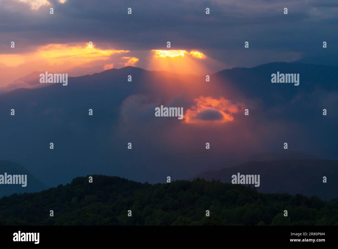 Sun rays pass through clouds hi-res stock photography and images - Alamy