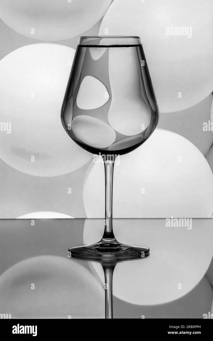 Pattern distortions seen through a glass of water. Still life Stock ...