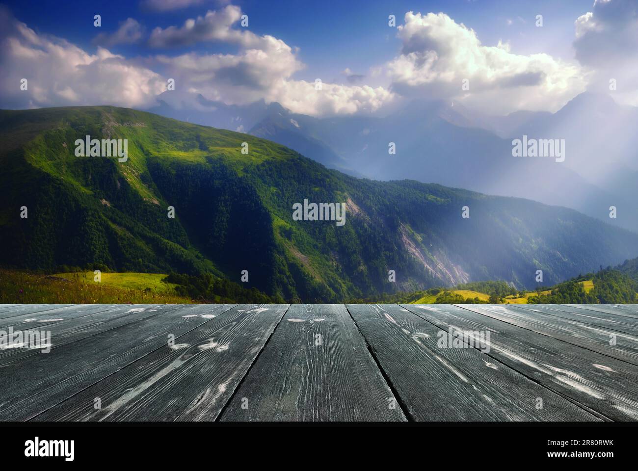 Beautiful mountains with empty wooden table. Natural template landscape ...