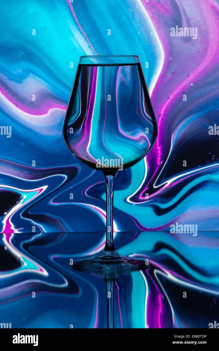 Pattern distortions seen through a glass of water. Still life Stock ...