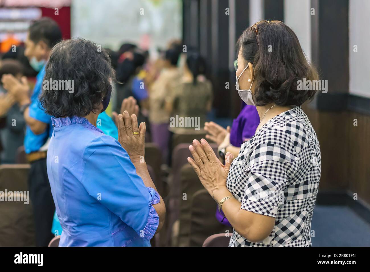 Back view of senior women wear face mask workout and exercise rhythmic ...