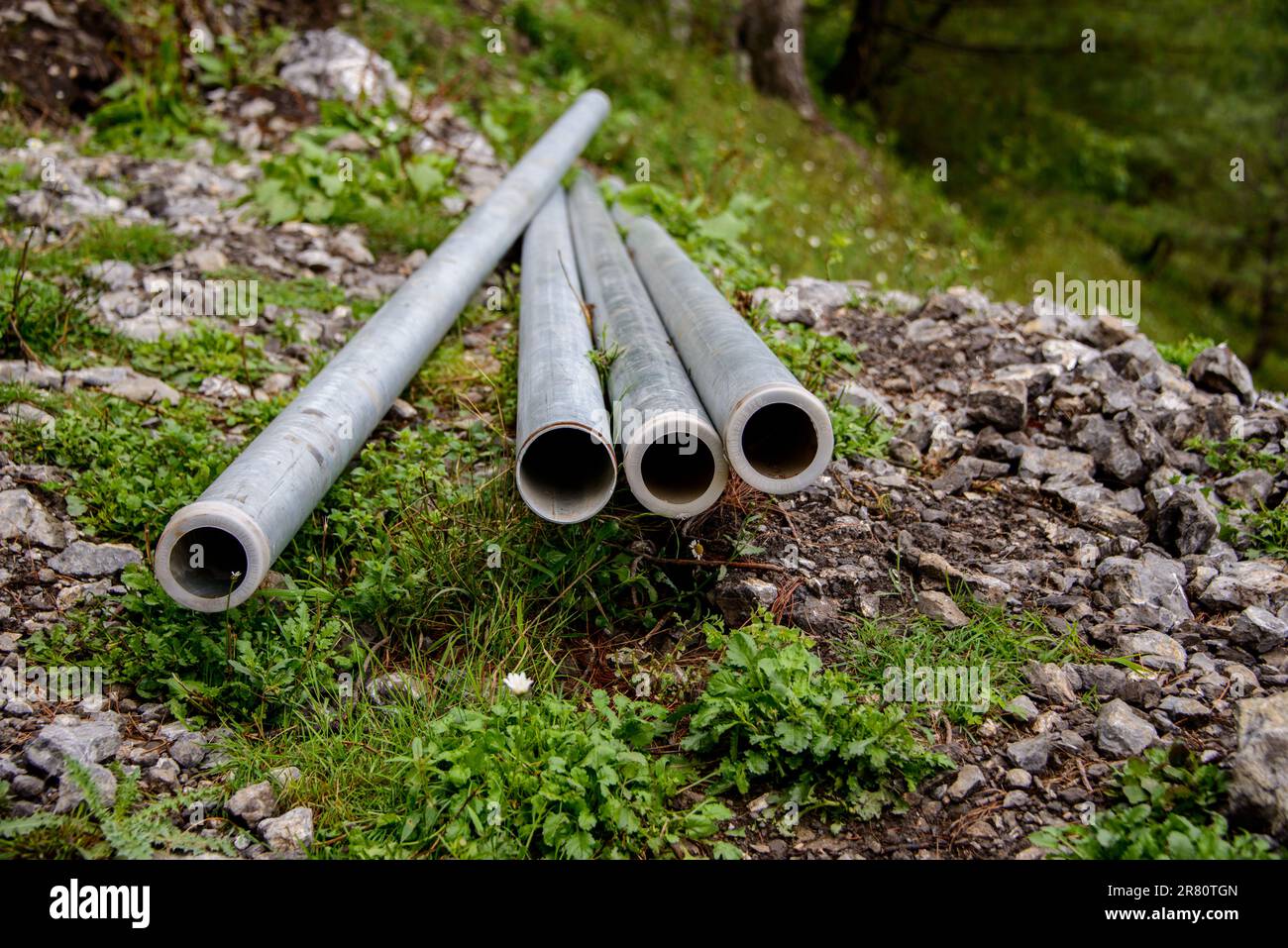 Old aluminum water pipe on the ground in Nathia Gali, Abbottabad ...