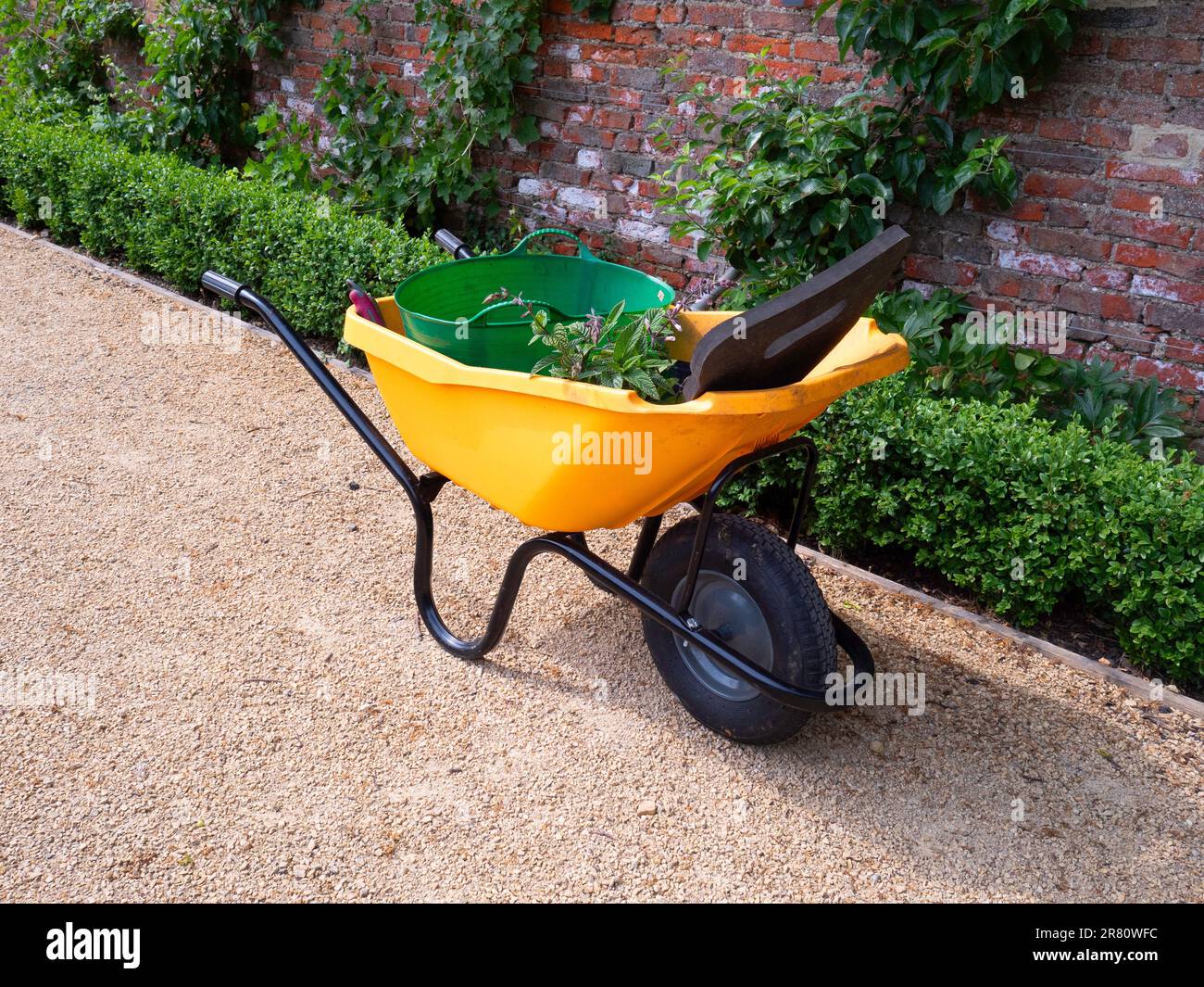 Gardening tools and wheelbarrow hi-res stock photography and images - Alamy