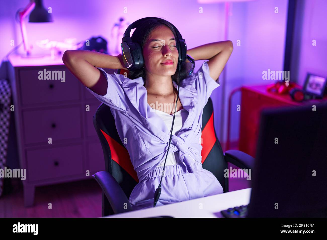 Young beautiful hispanic woman streamer smiling confident relaxed with ...