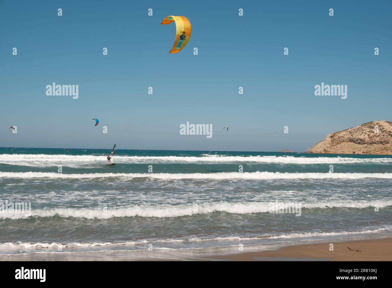 Different wake boarders surfing in the sea at the Prasonisi Beach at ...