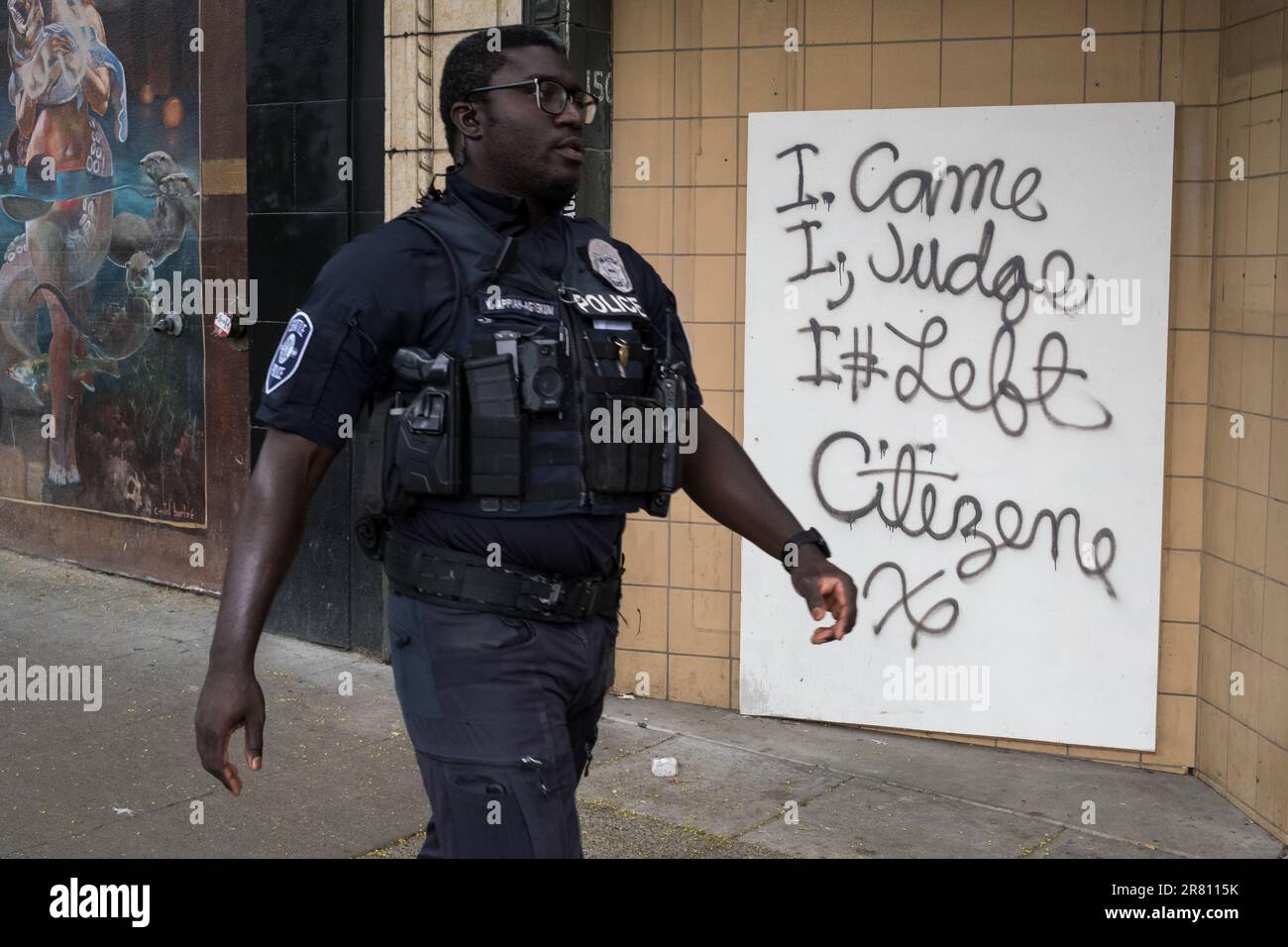 Seattle, USA. 25th Apr, 2022. A police officer on 1st and Pike during a ...