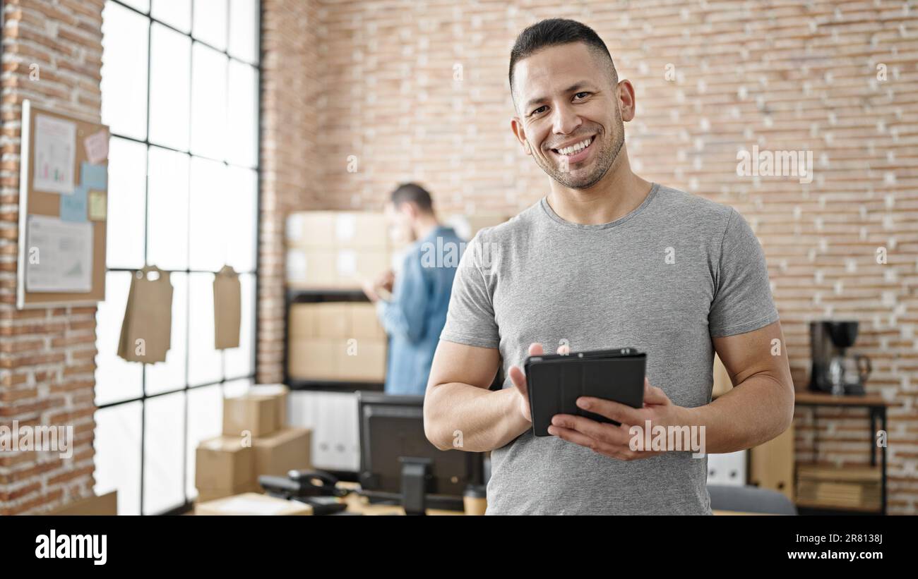 Two ecommerce business workers using hi-res stock photography and ...