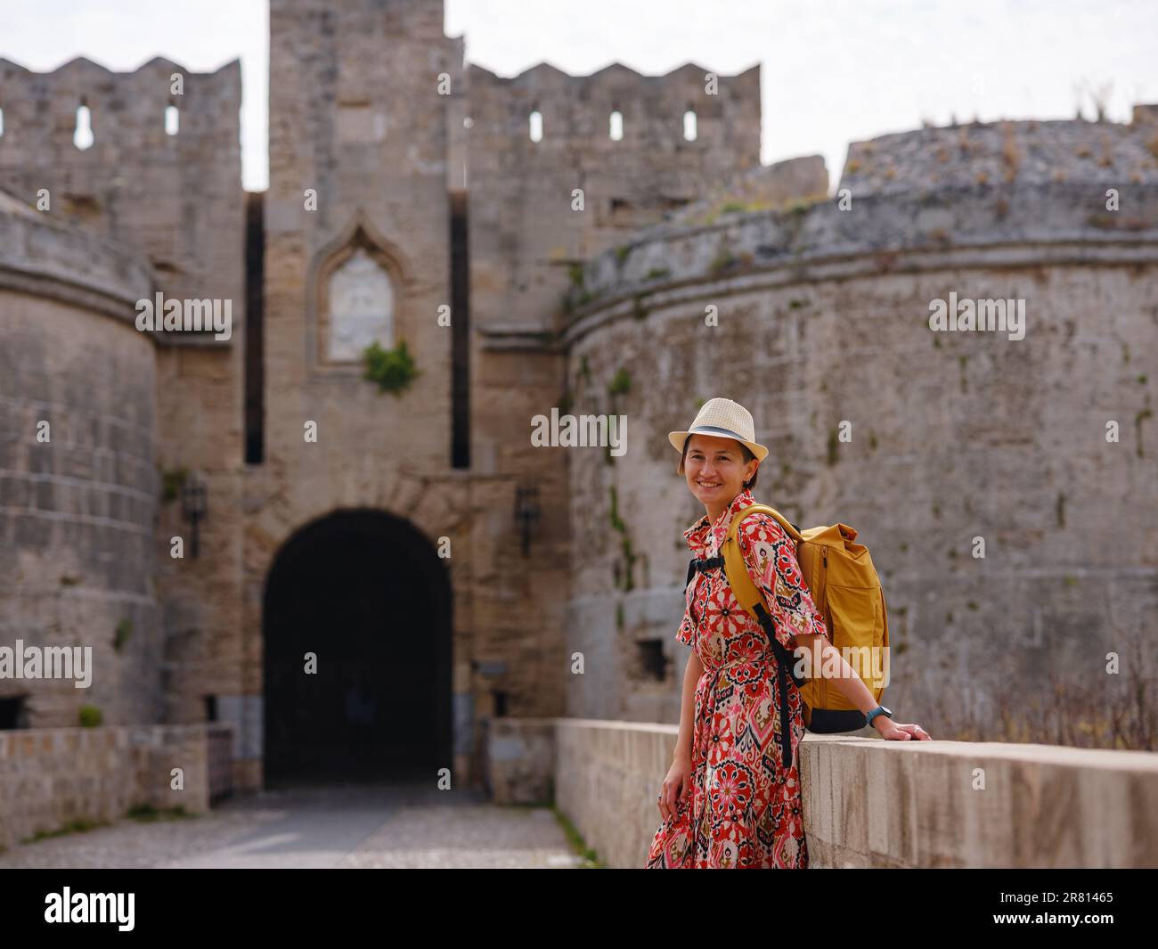 summer trip to Rhodes island, Greece. Young Asian woman in ethnic red ...