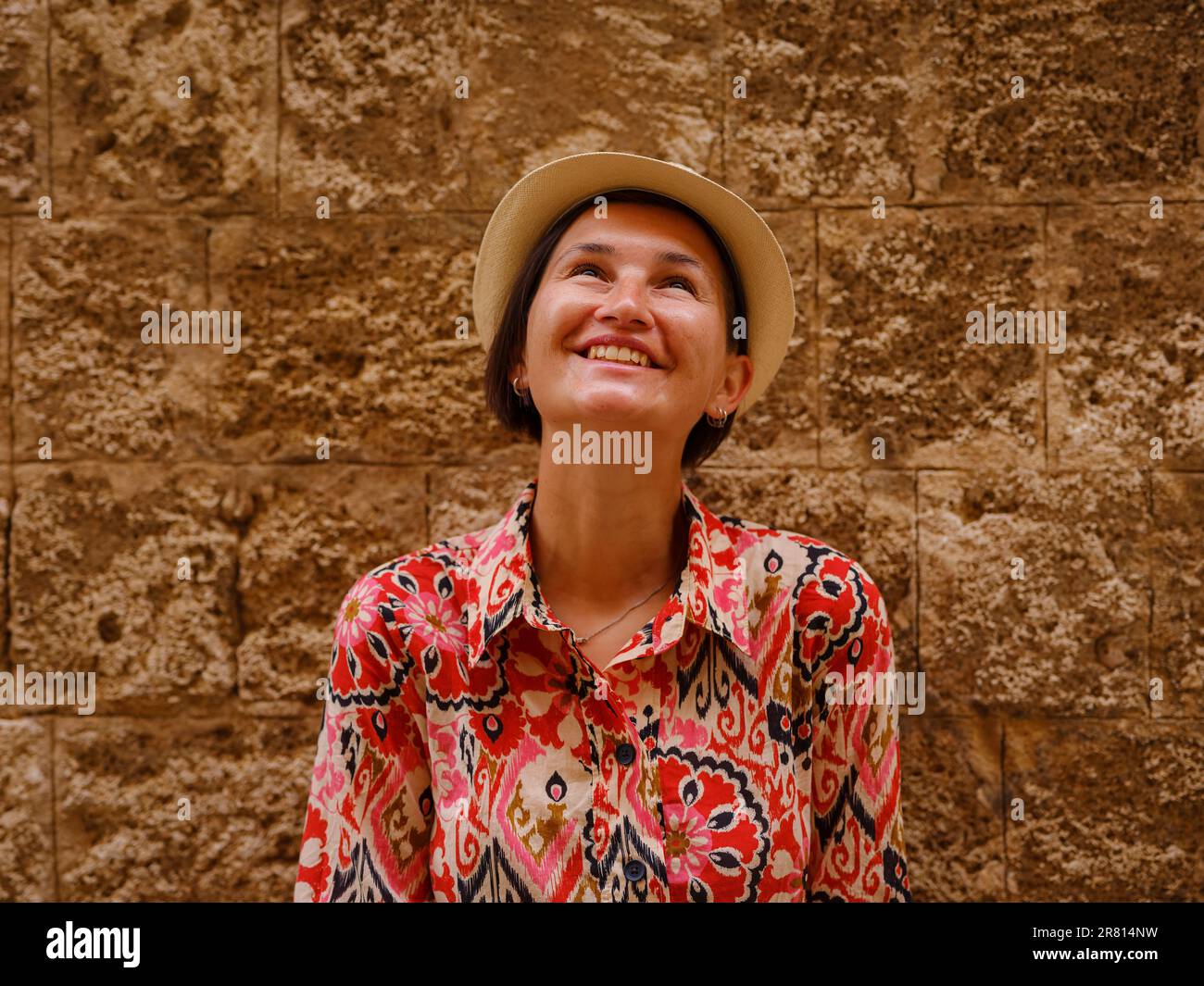 summer trip to Rhodes island, Greece. Young Asian woman in ethnic red ...