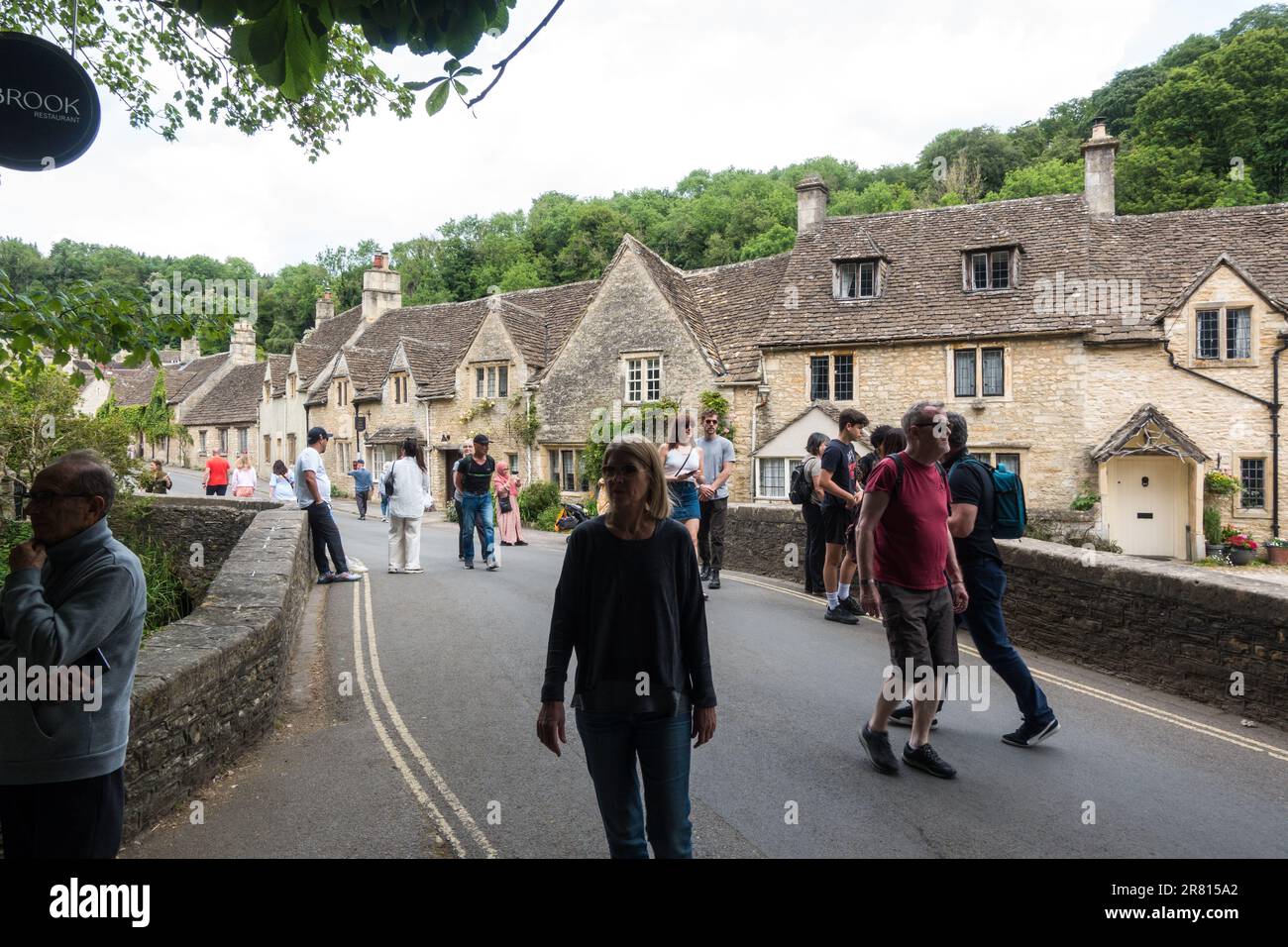 Visitors filled up streets of Castle Combe during bank holiday Stock ...