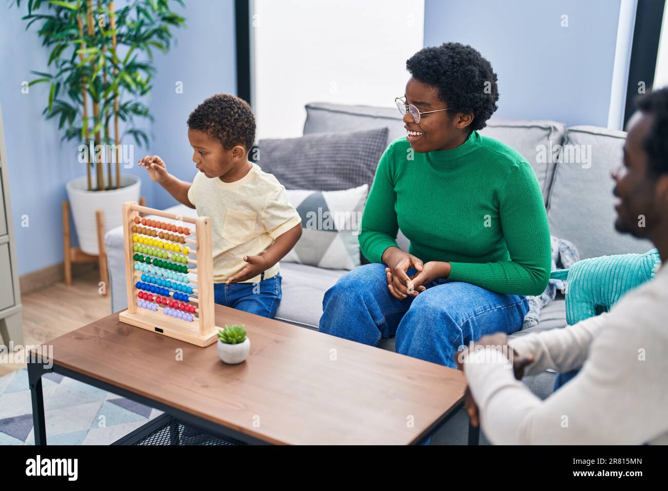 African american family playing with abacus at home Stock Photo - Alamy