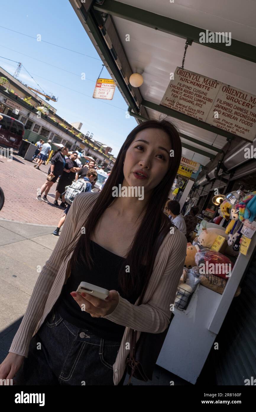 Seattle, USA. 12 Jun, 2023. A sylish person visiting Pike Place Market ...