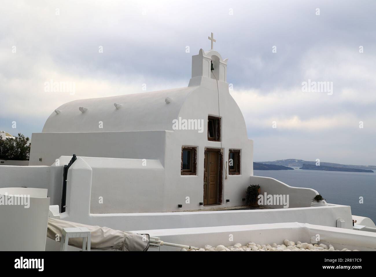 Small white church of the Cyclades Island of Santorini-Greece Stock ...