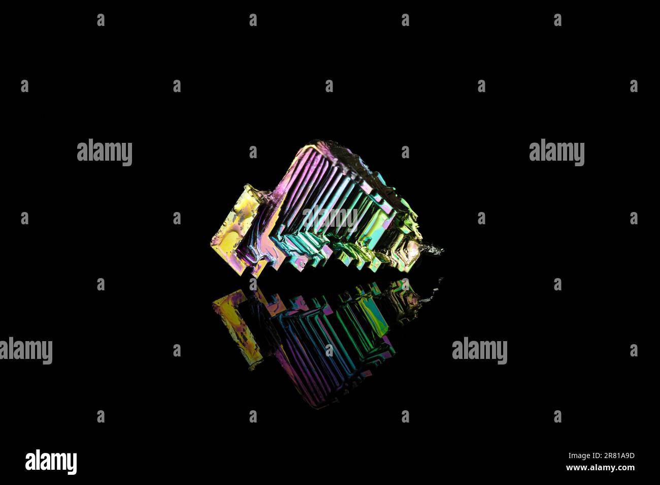 bismuth crystal isolated on black background. macro detail texture ...