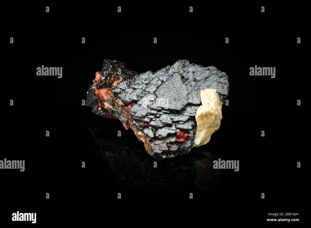 magnetite with hematoid quartz isolated on black background. macro ...