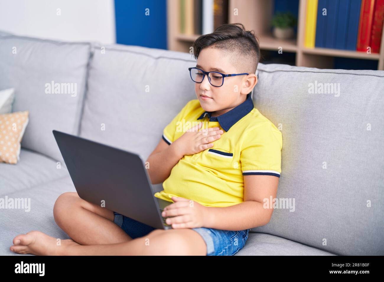 Adorable hispanic boy having video call communicate with sign deaf ...